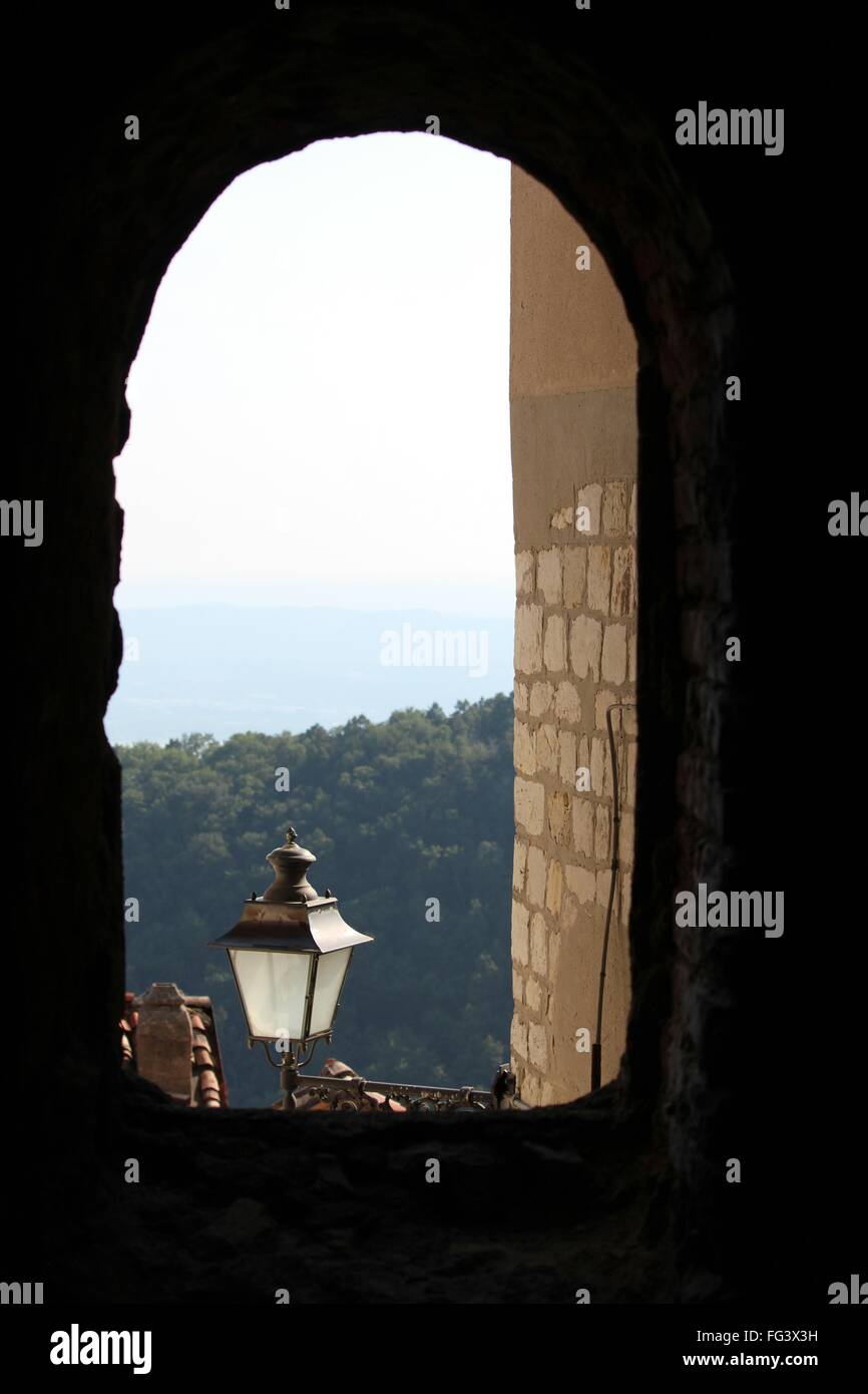 Gas Light Seen Through Arch Window Of Historic Building Stock Photo - Alamy