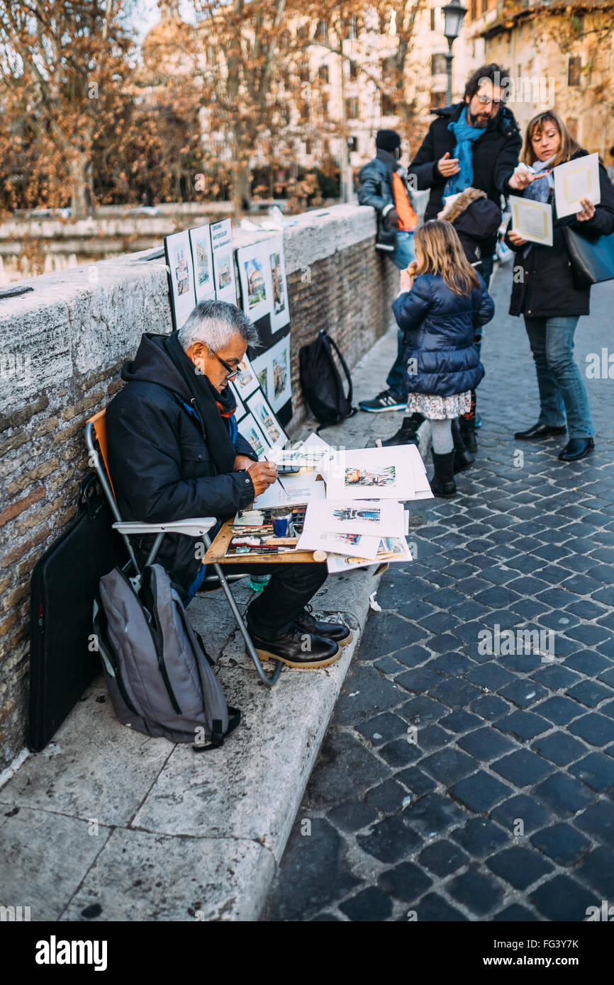 An artist paints scenes of Rome from Ponte Fabricio while a family in ...