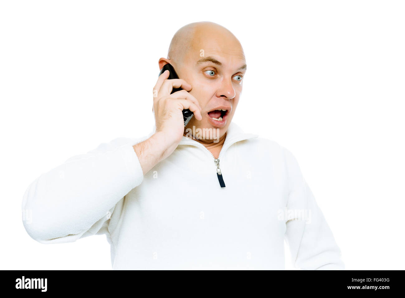 Bald man emotionally communicates by phone. Isolated on white. Studio ...