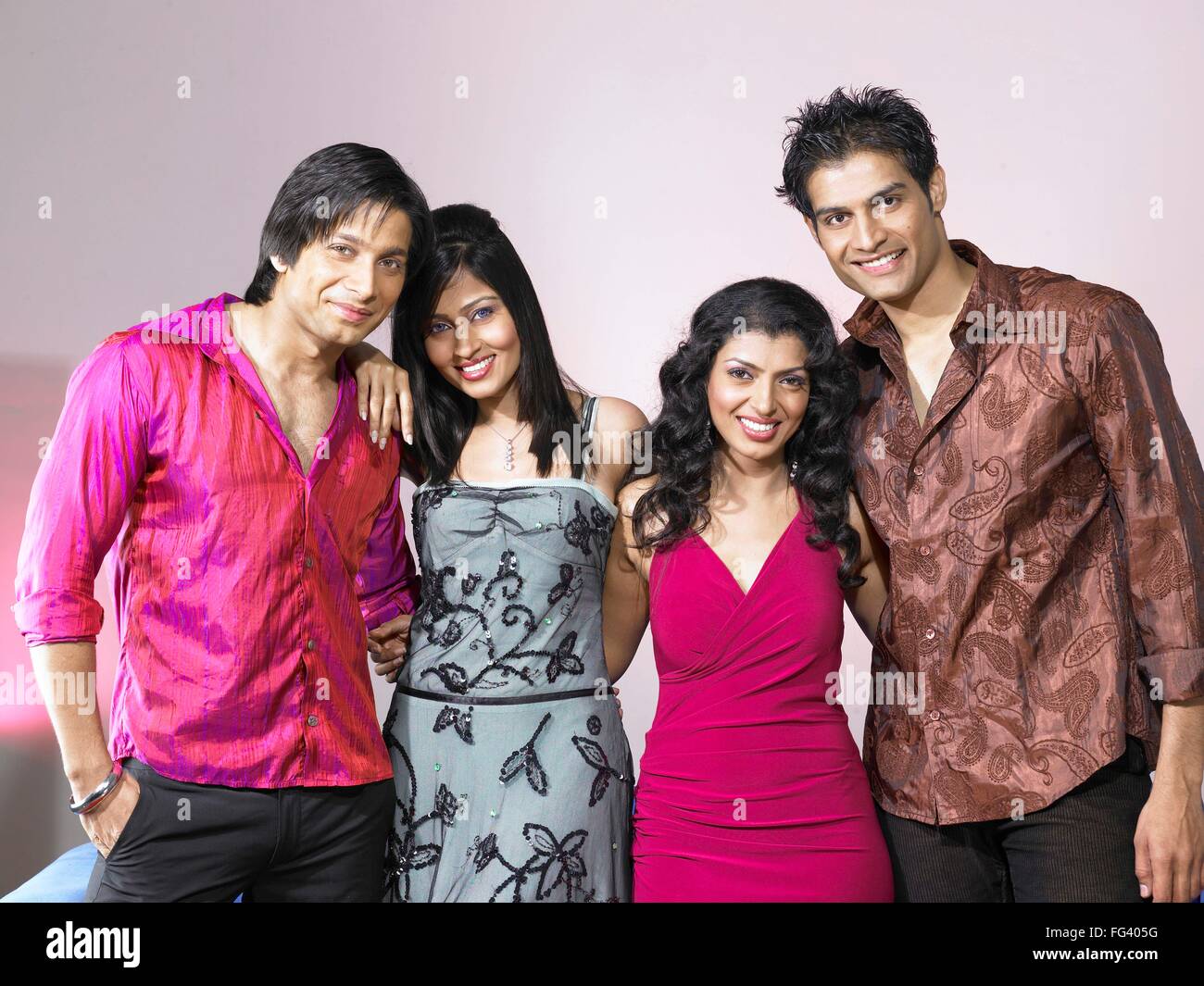 South Asian Indian men and women standing together in party MR Stock ...