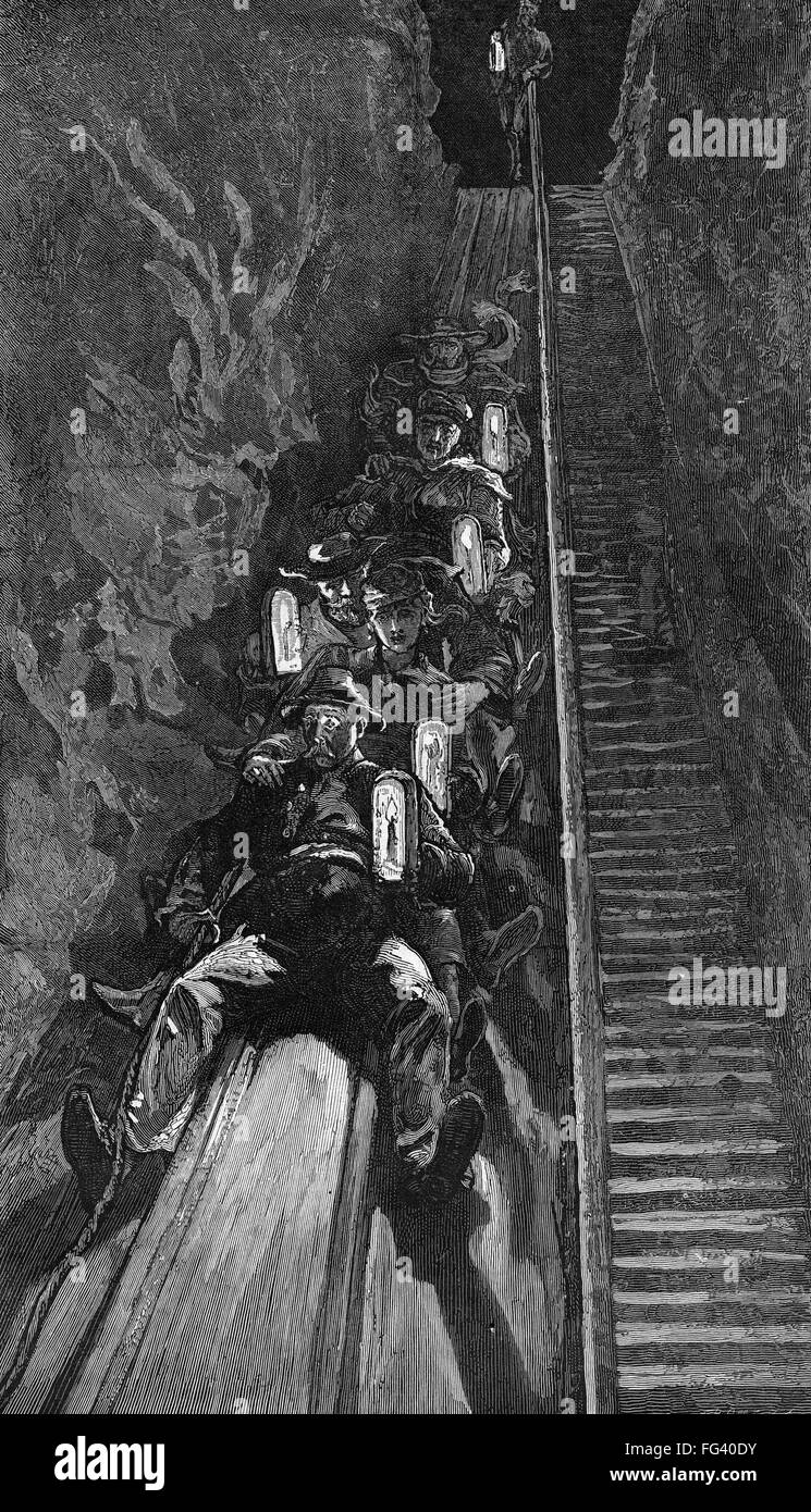 GERMANY: SALT MINE, 1875. /nTourists sliding down a wooden slide to the ...