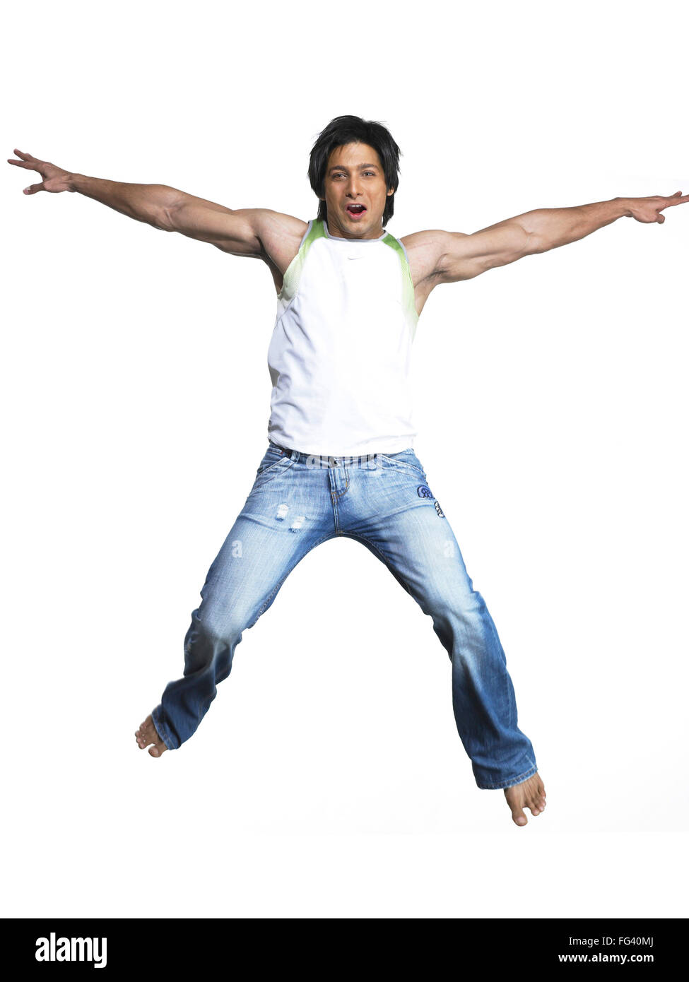 South Asian Indian man jumping with joy MR Stock Photo - Alamy