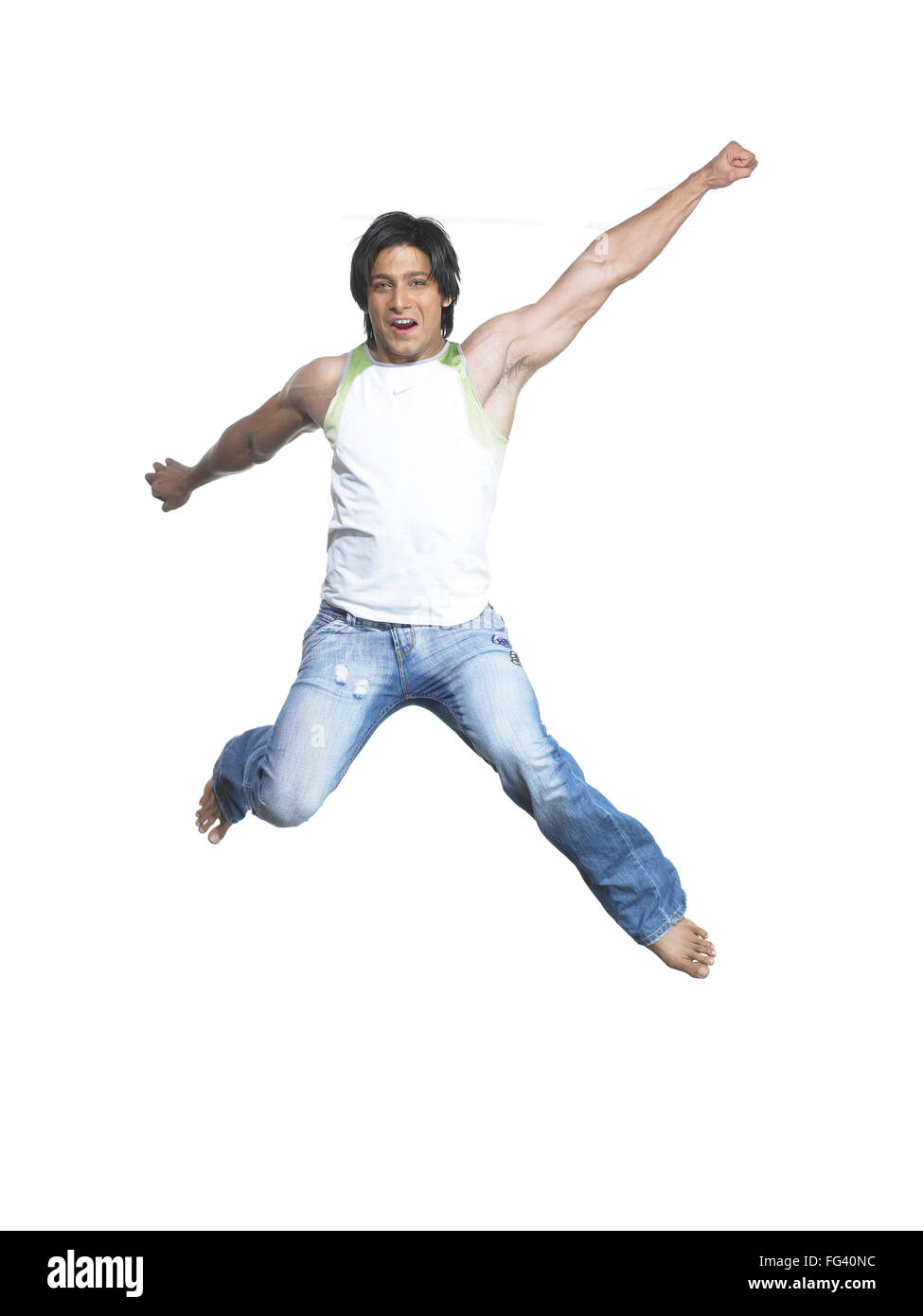 South Asian Indian man jumping with joy MR Stock Photo - Alamy