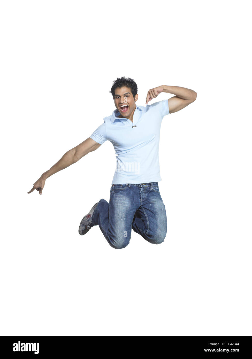 South Asian Indian man jumping with joy MR Stock Photo - Alamy