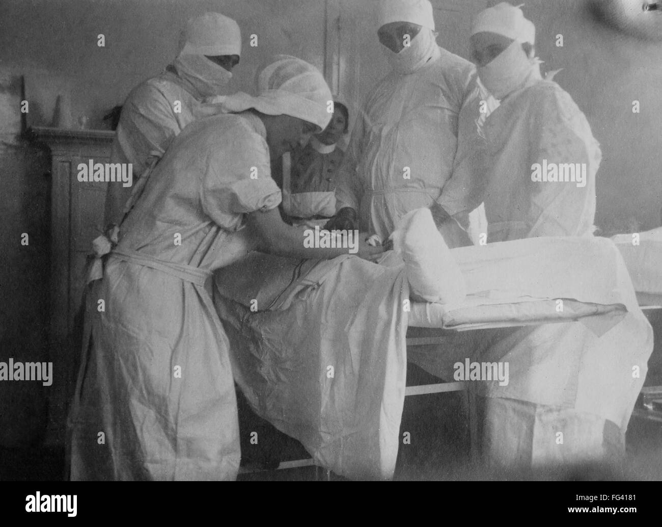 WWI: HOSPITAL, c1915. /nPerforming a surgery at the Canadian hospital ...