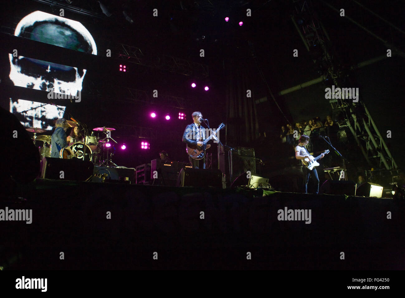 The Kings of Leon performing on the Pyramid stage at the Glastonbury ...