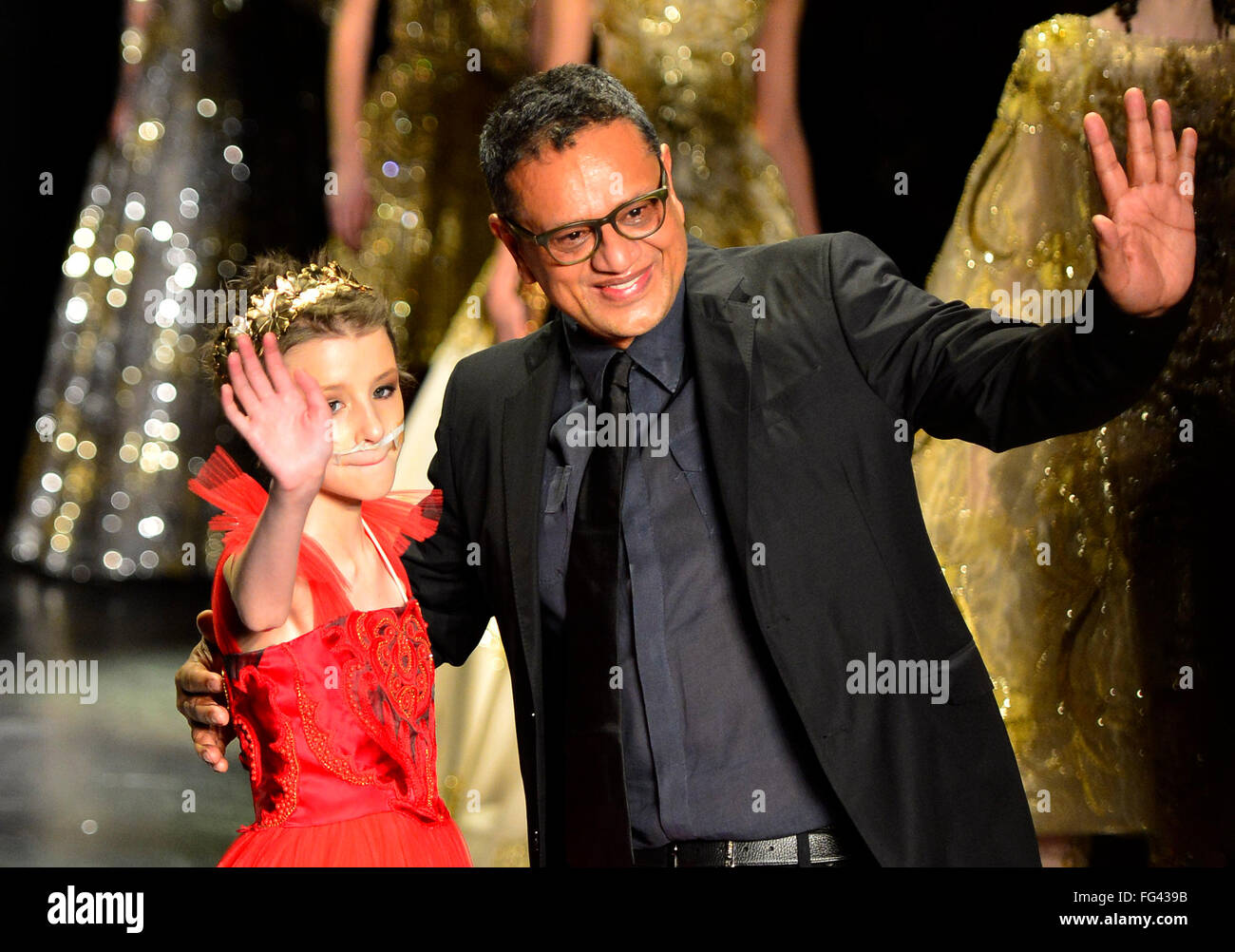 New York, USA. 17th Feb, 2016. Trinity Faith Moran (L) and designer ...