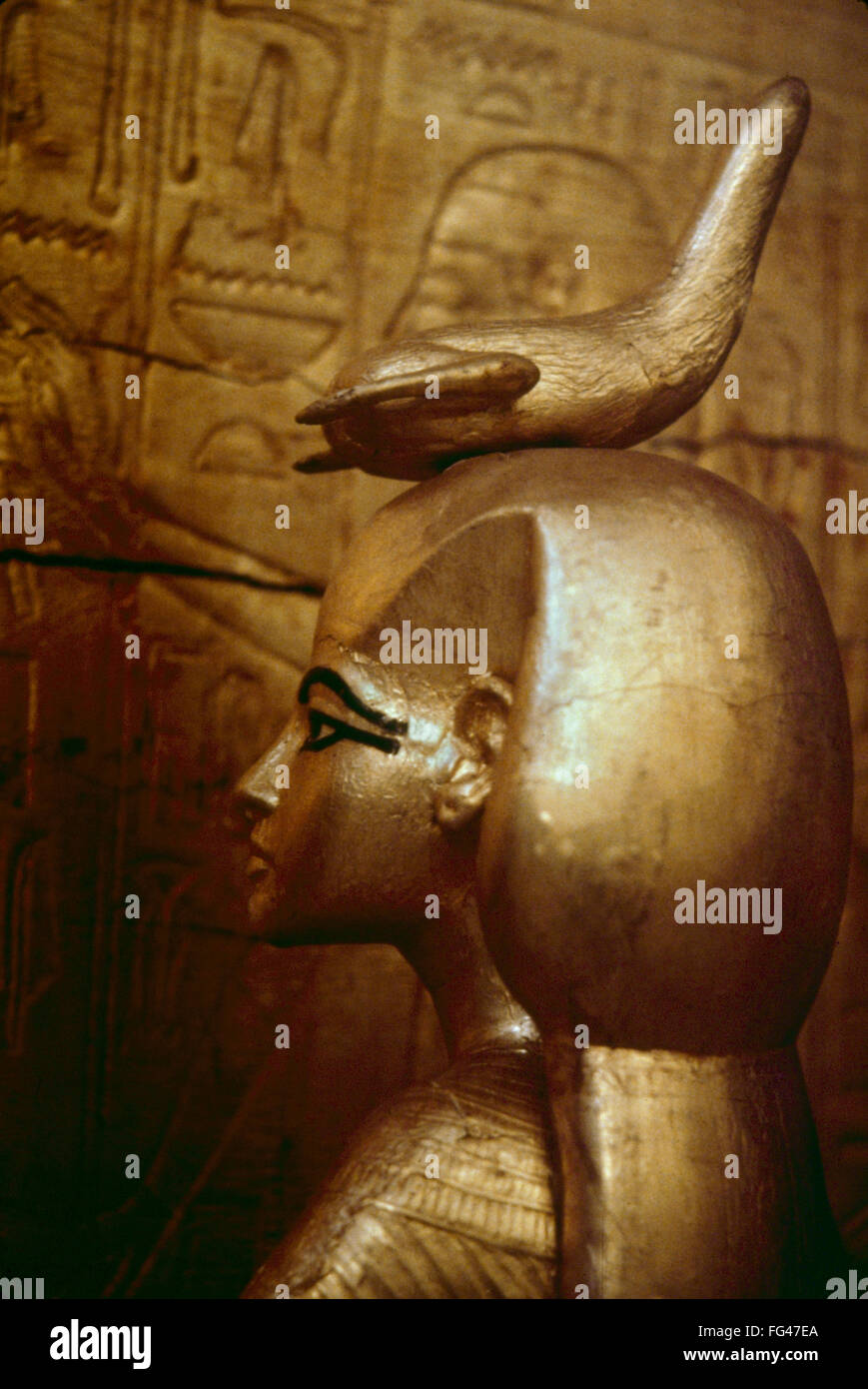 EGYPTIAN GODDESS SELKET. /nGilded wood figure of Selket, the goddess of ...