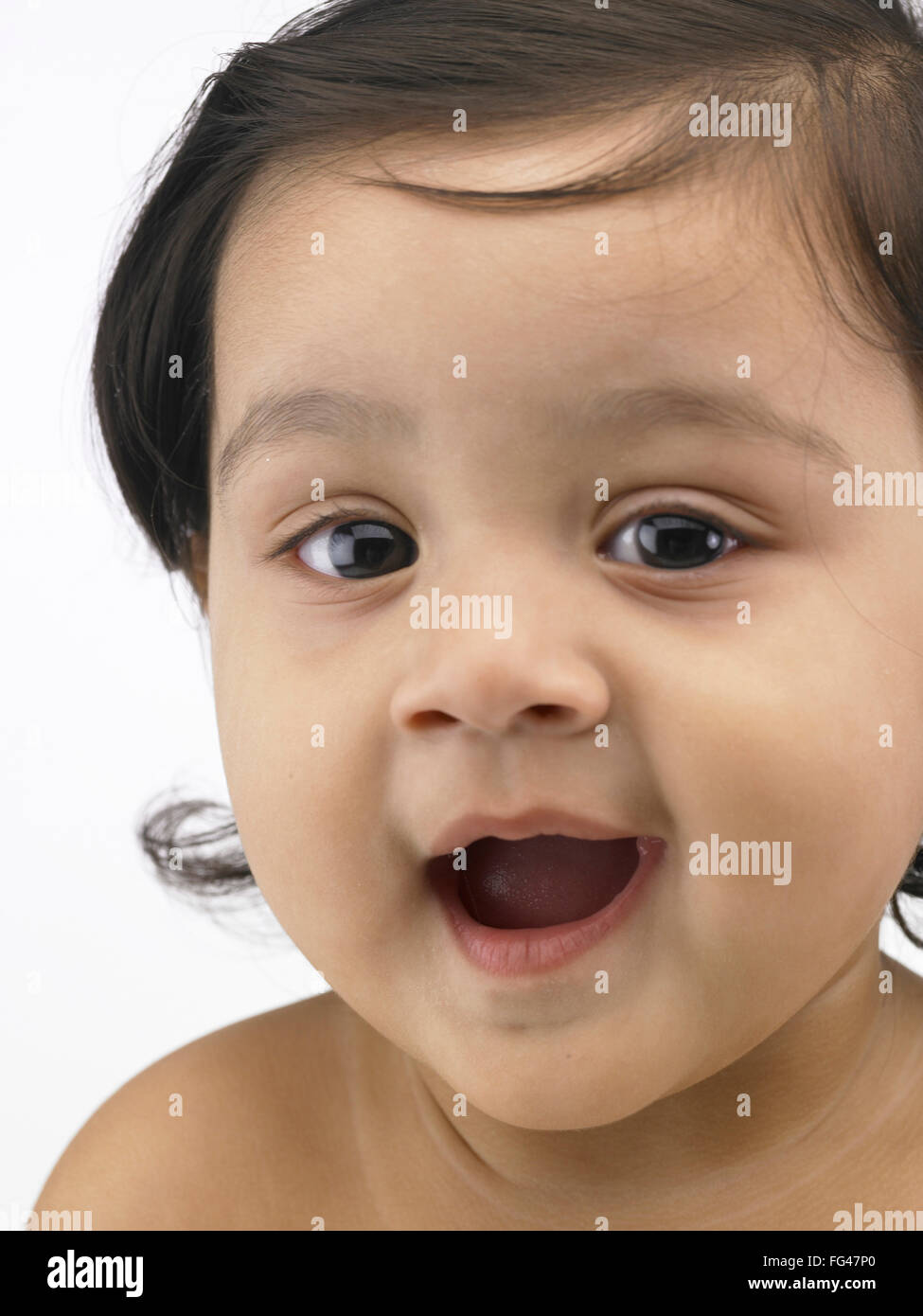Baby face portrait on white background - MR#702O Stock Photo - Alamy