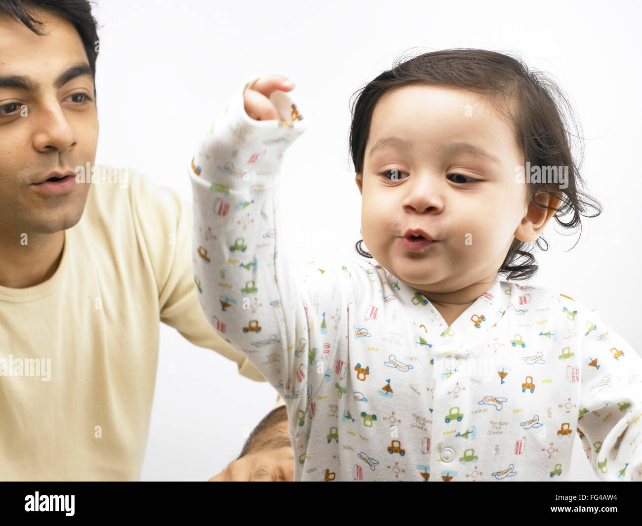 Indian man holding baby daughter hi-res stock photography and images ...