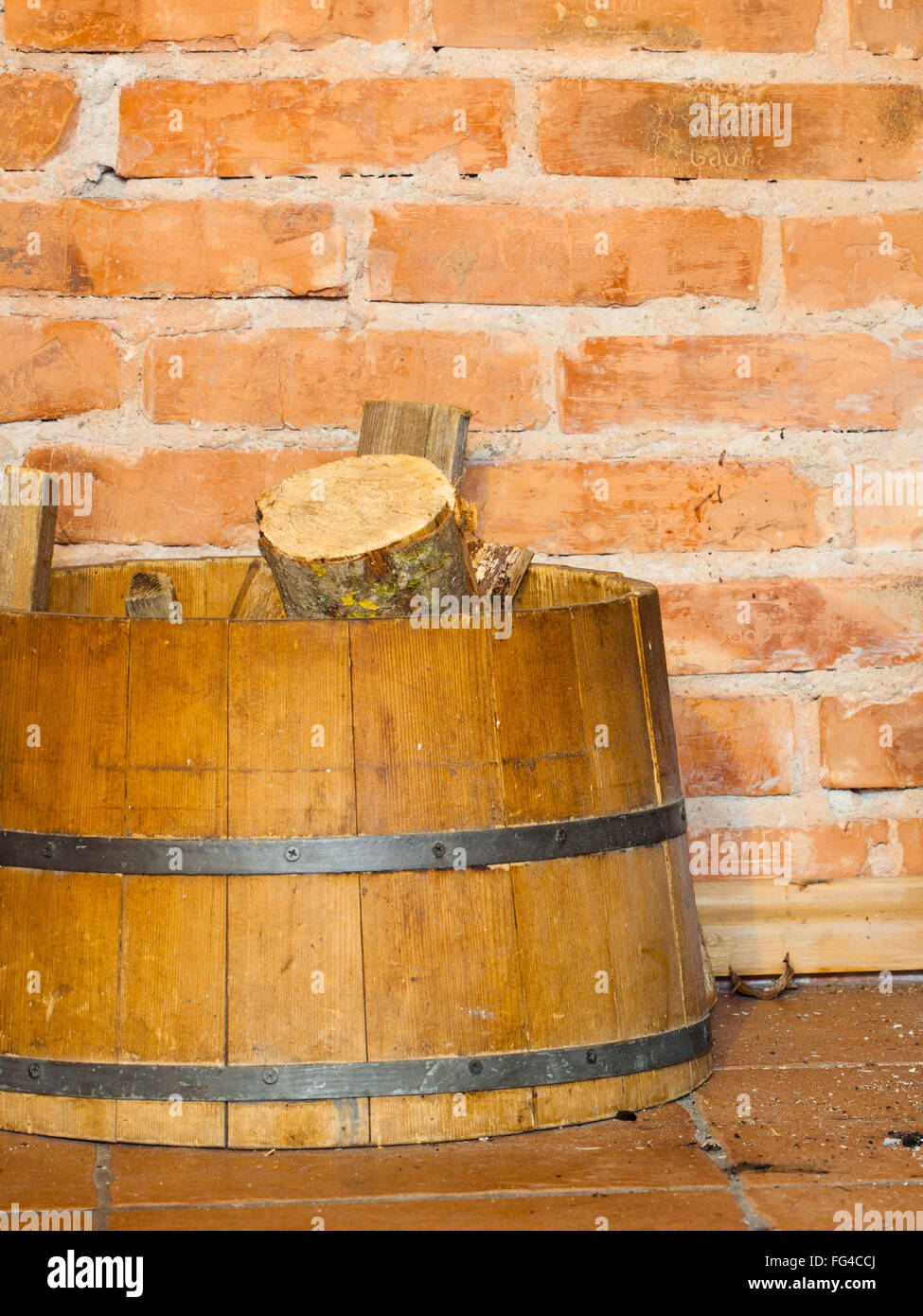 Winter at home. Closeup of firewood fire wood in the barrel interior ...