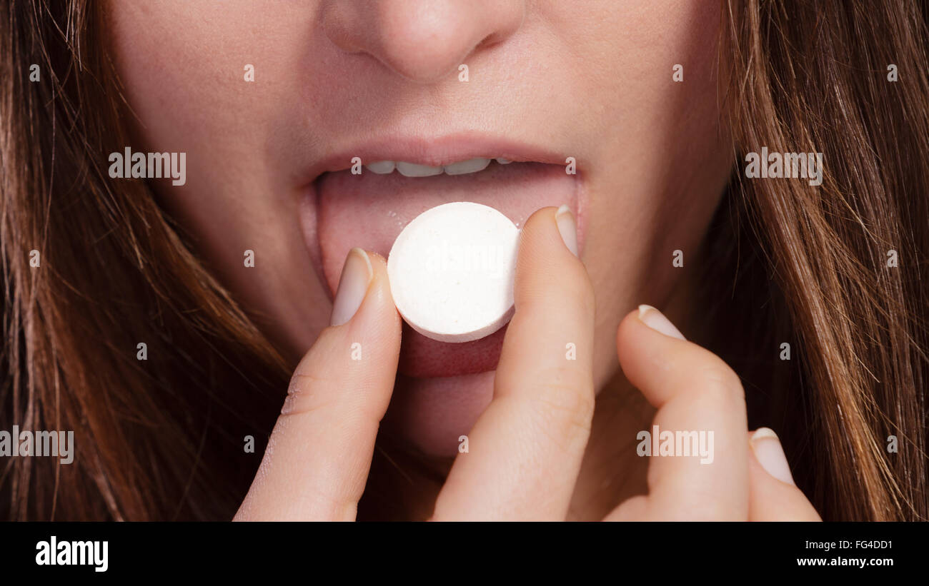 Tablet swallowing hi-res stock photography and images - Alamy