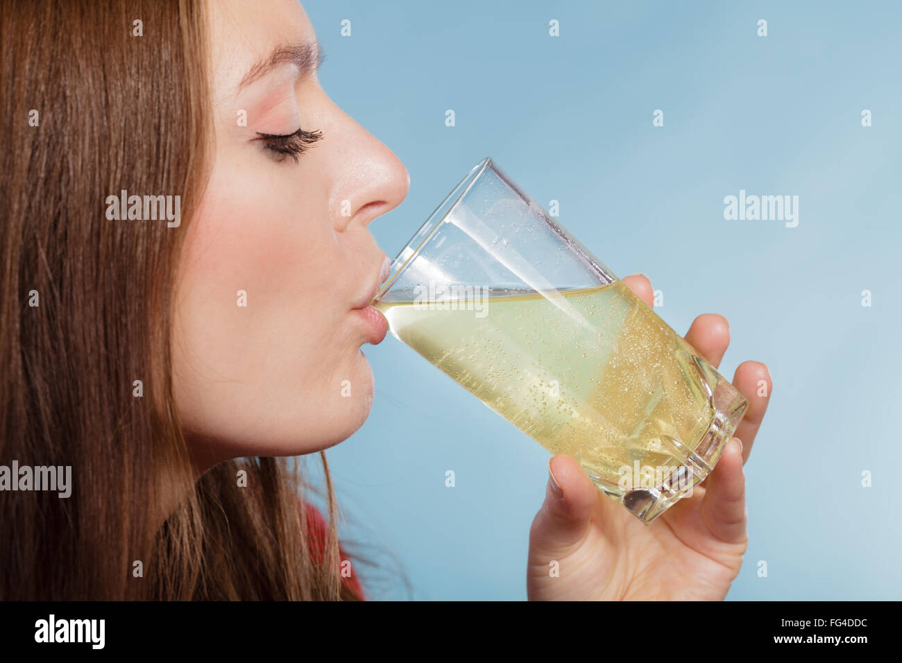 Woman drinking fizzy water hi-res stock photography and images - Alamy