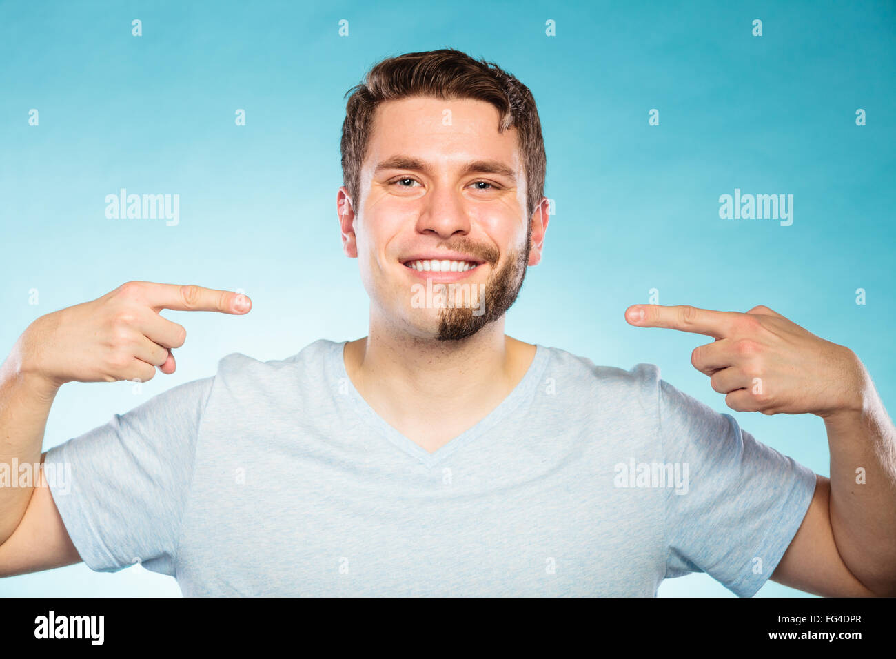 Portrait of happy man with half shaved face beard hair. Smiling ...