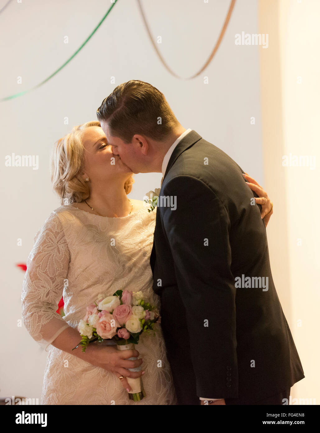 Mature couple kissing after getting married Stock Photo - Alamy