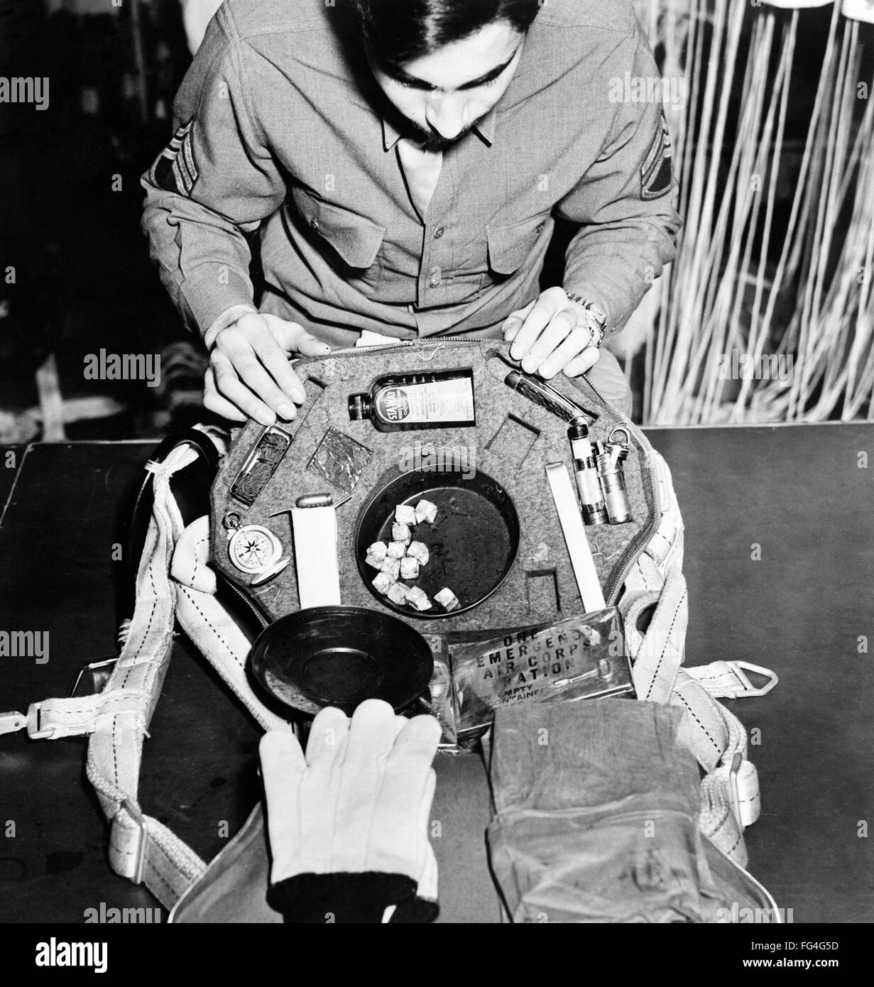 WWII: SOLDIER, c1943. /nAmerican soldier Tony Gaudiello inspecting a ...