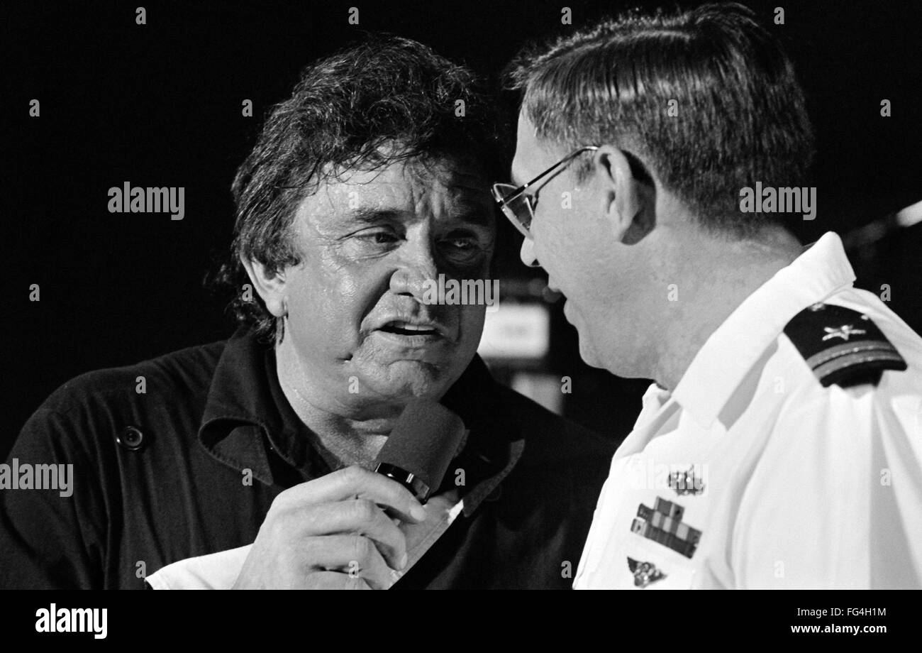 JOHNNY CASH (1932-2003). /nAmerican musician. Singing a duet with a U.S ...