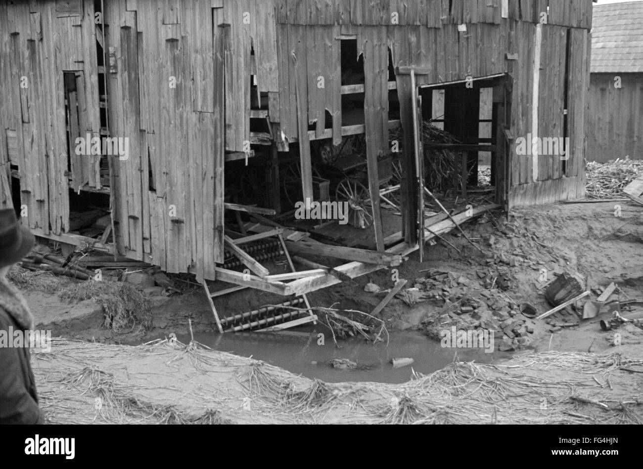 MASSACHUSETTS: FLOOD, 1936. /nA ruined barn and farm equipment in ...