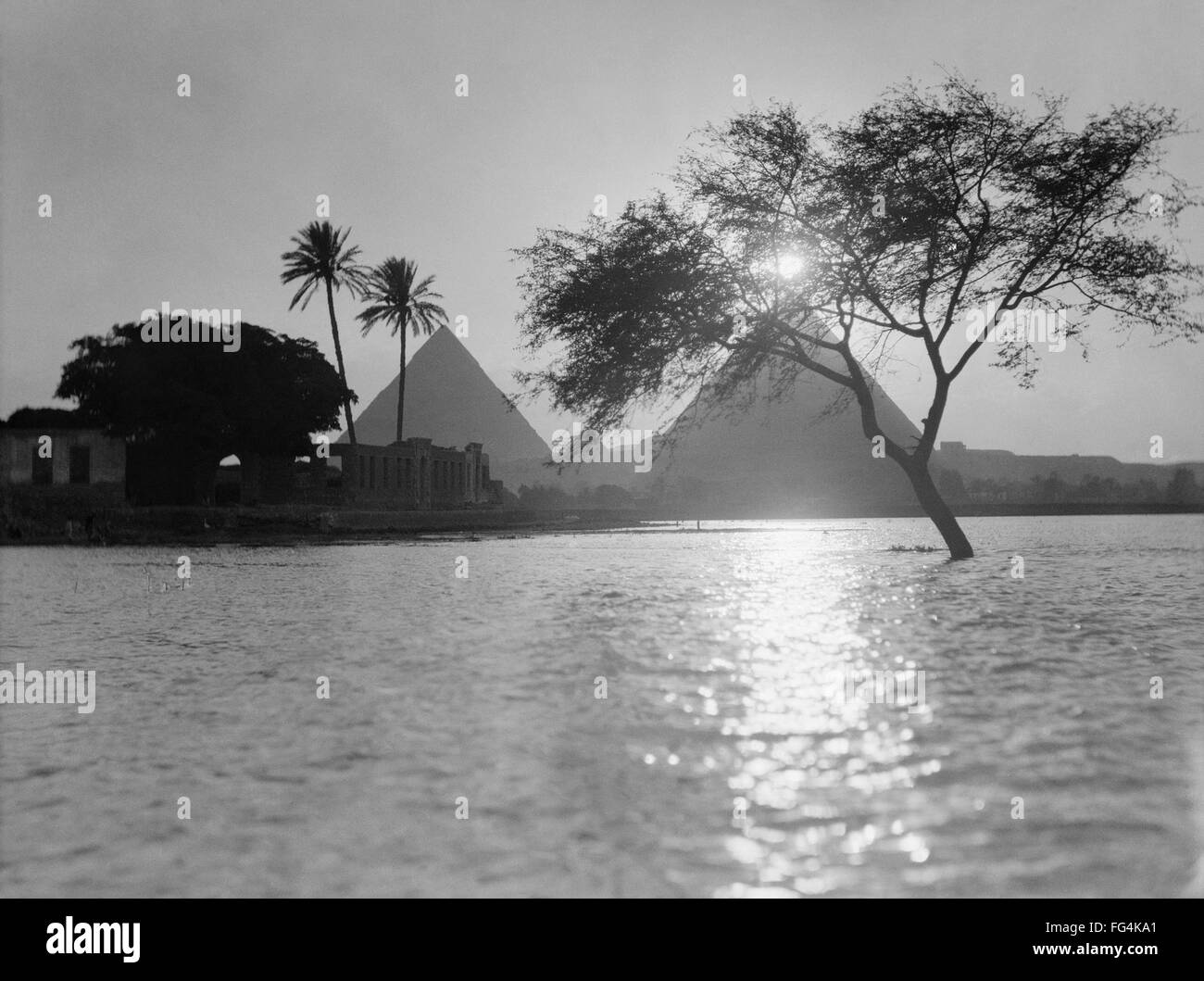 EGYPT: NILE, c1934. /nA view of the pyramids along the Nile River at ...