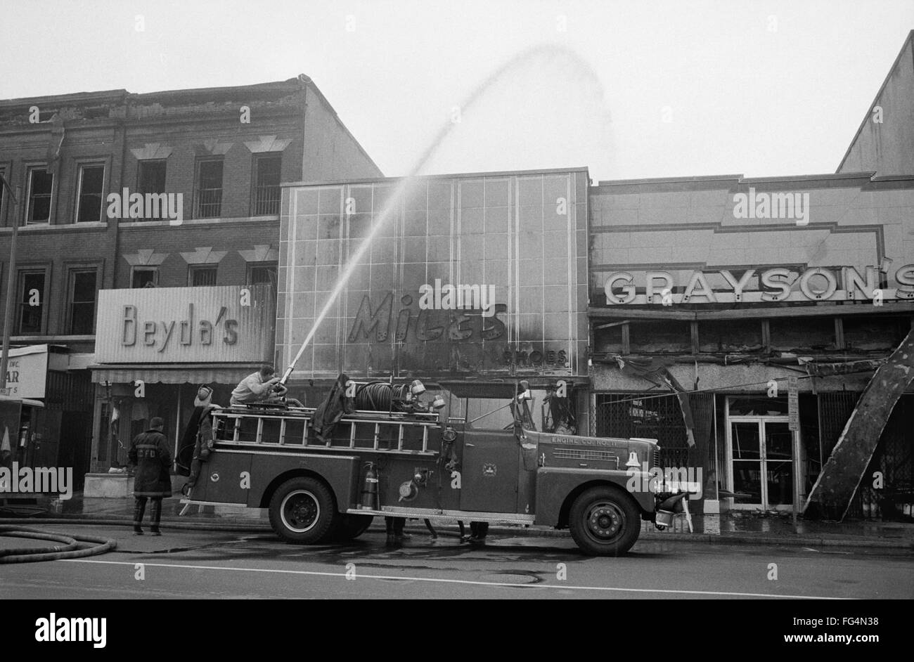 WASHINGTON: RIOTS, 1968. /nFiremen hosing down buildings that were ...