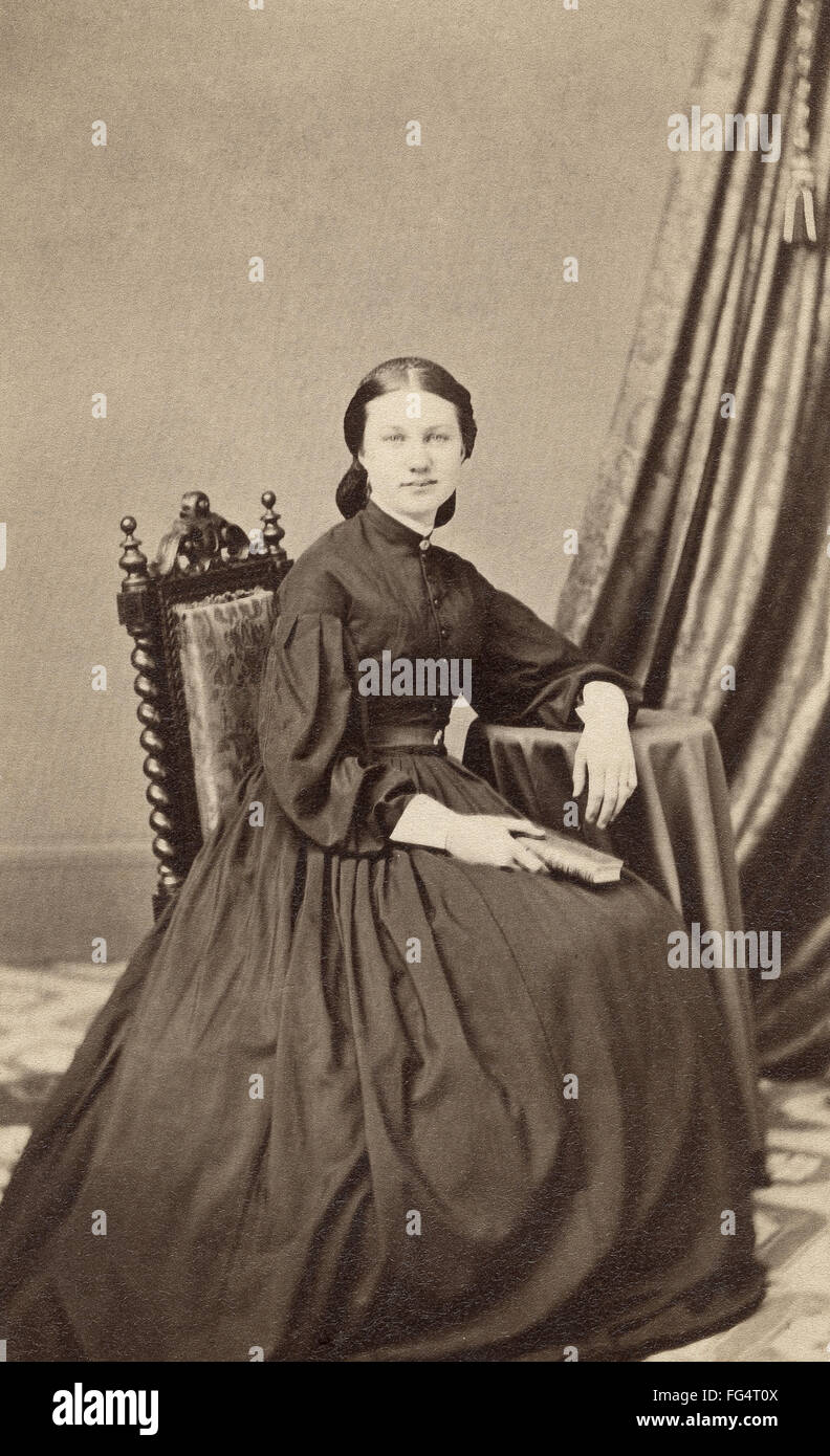 WOMAN, 19th CENTURY. /nA seated woman, photographed by Webster ...