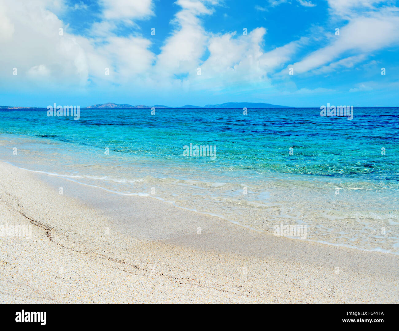 white pebbles in Fiume Santo under a blue sky in Sardinia Stock Photo ...