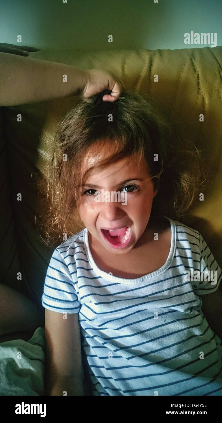 Pulling up hair hi-res stock photography and images - Alamy