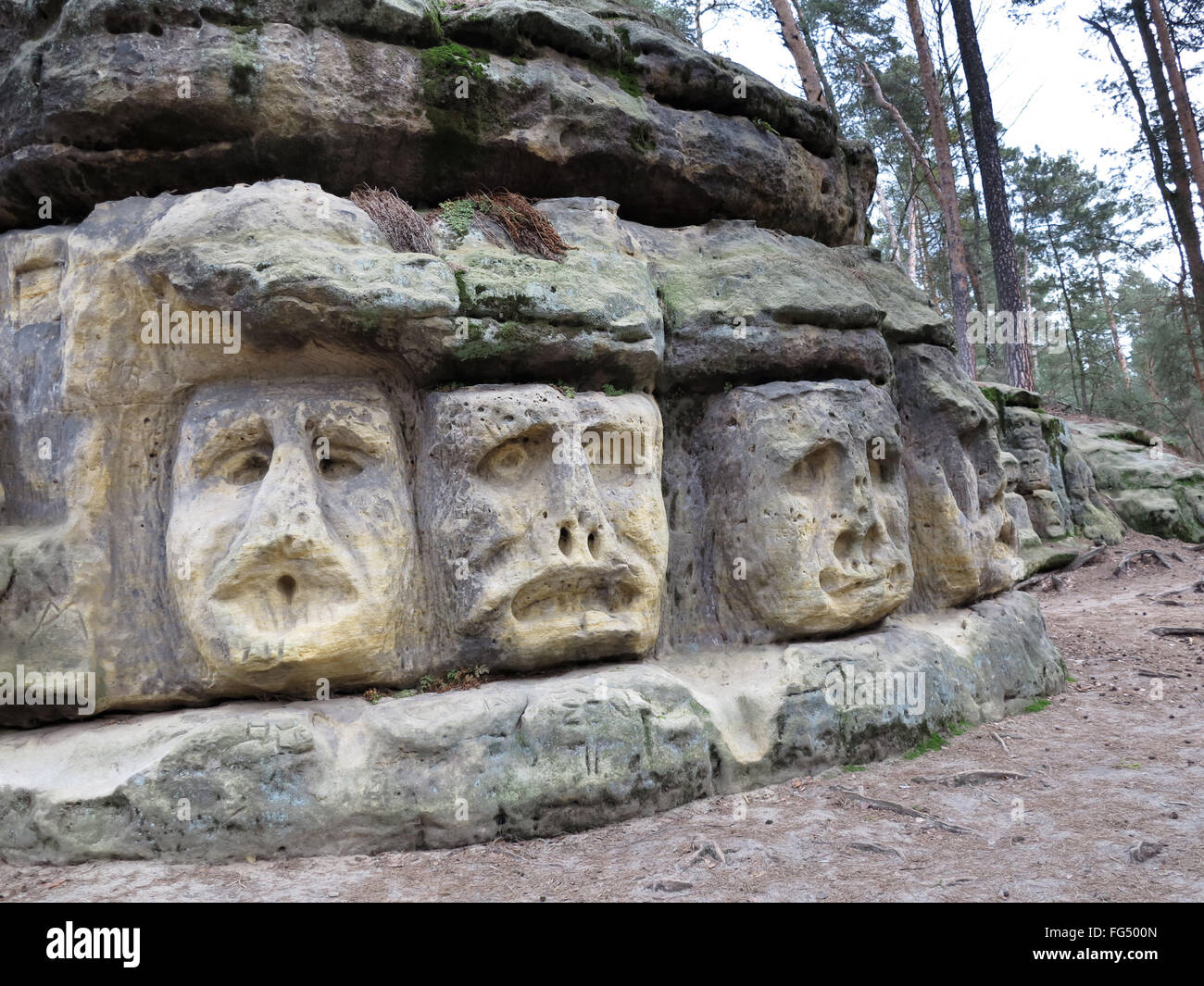 Scary Stone Heads - rock sculptures of giant heads carved into the ...
