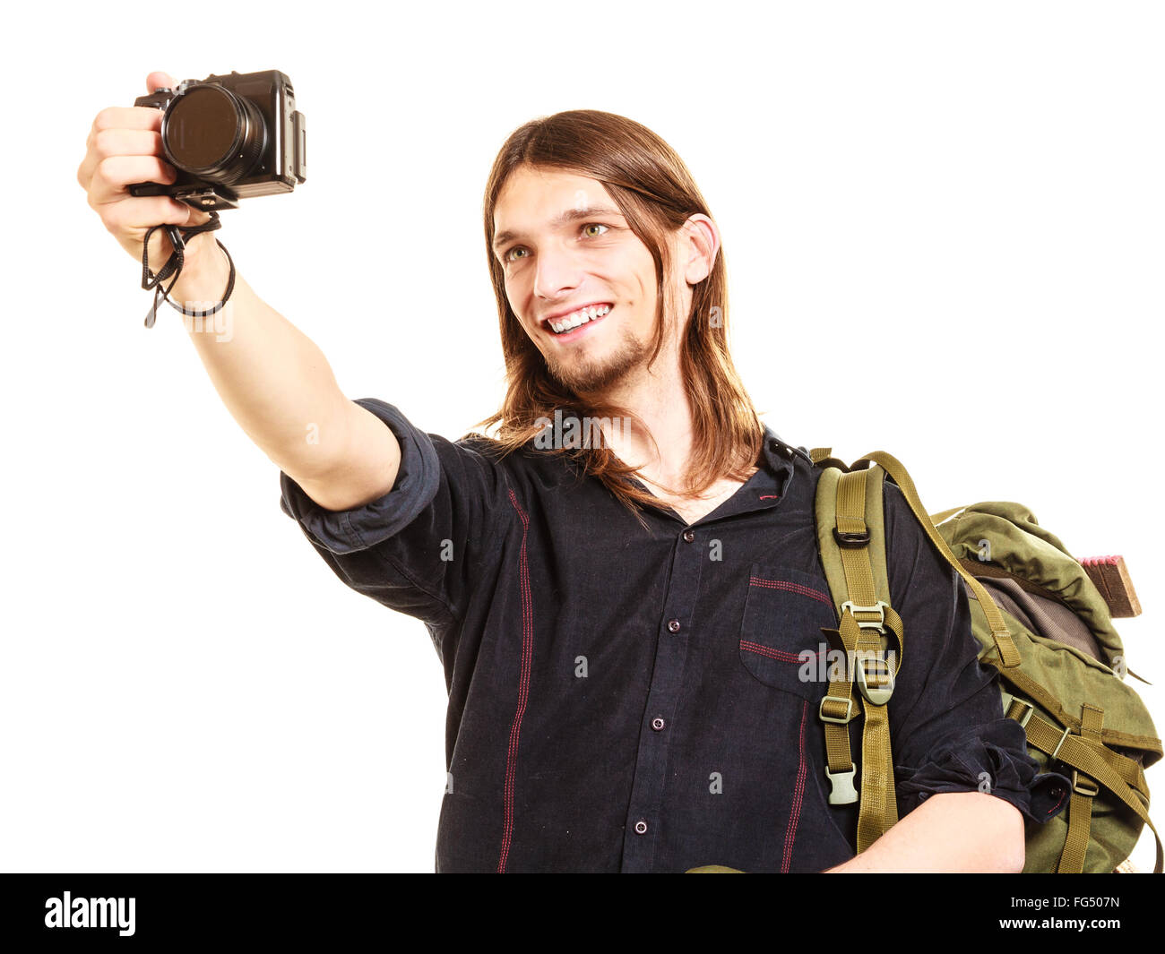 Man tourist backpacker on trip taking photo picture with camera. Young ...