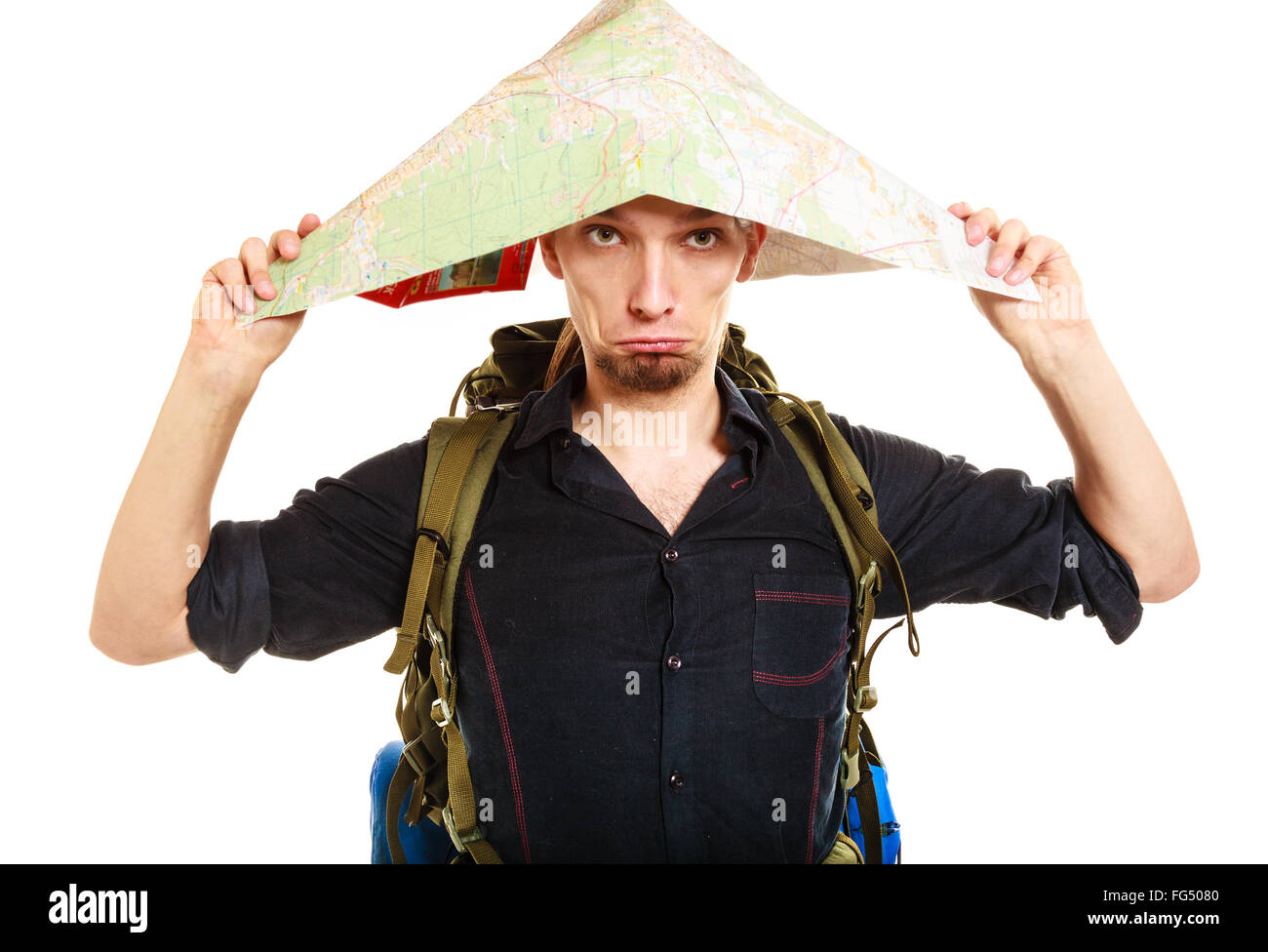Man tourist backpacker with paper map hat. Young guy backpacking ...