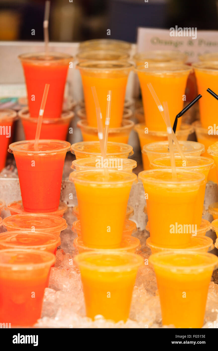 Closeup food stall outdoor on street, cold fruit juice drink takeaway ...
