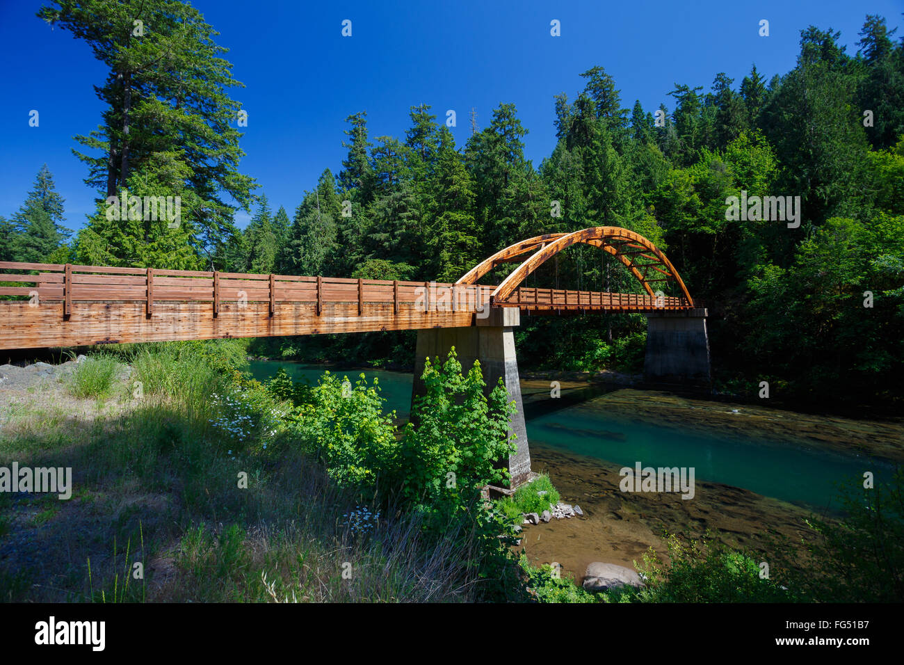 Tioga bride made out of wood over the North Umpqua River in Oregon ...