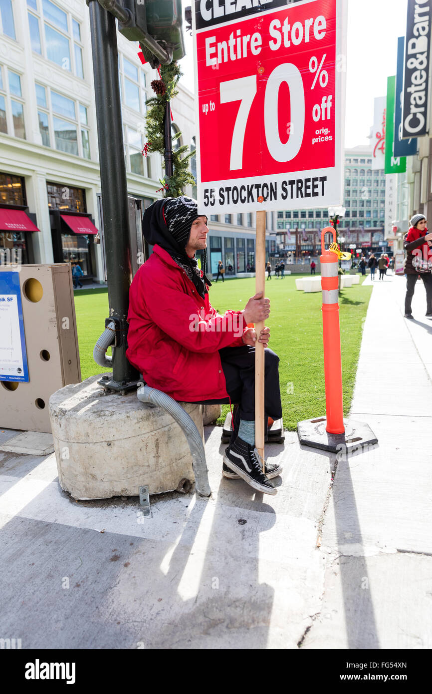 Man holding sign hi-res stock photography and images - Alamy
