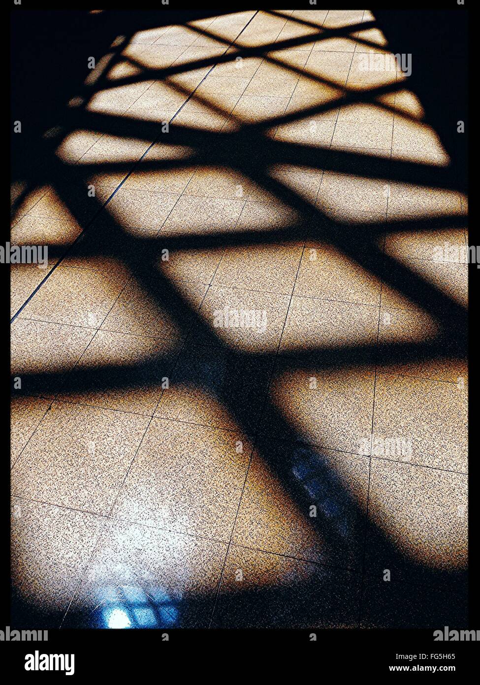 High Angle View Of Shadow On Tiled Floor Stock Photo - Alamy