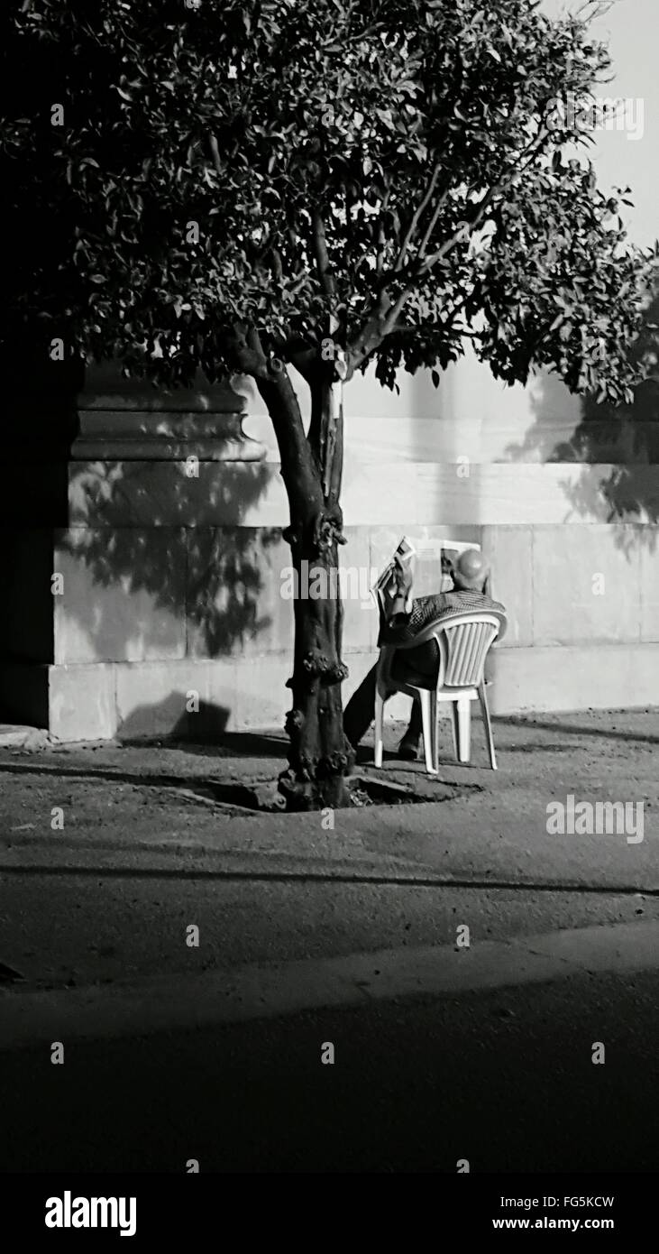 Man Sitting Chair Reading Newspaper High Resolution Stock Photography ...