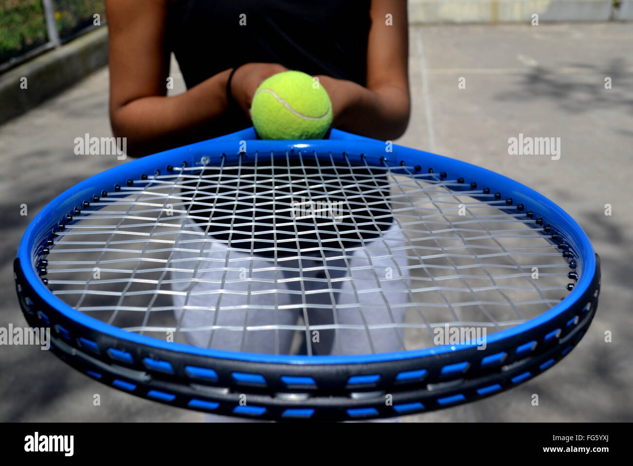 Young man tennis racket hi-res stock photography and images - Alamy