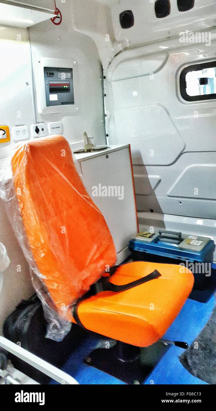 Orange Empty Chair In Ambulance Stock Photo - Alamy