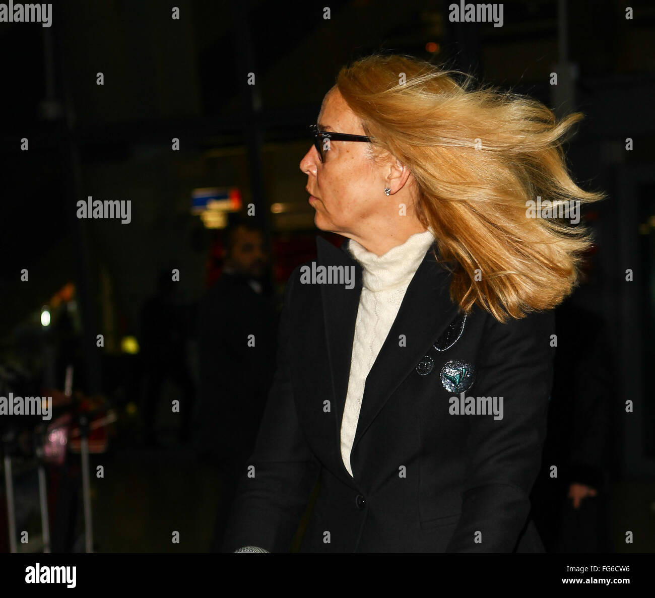 Jerry Hall, recently engaged to Rupert Murdoch, arrives at Heathrow ...