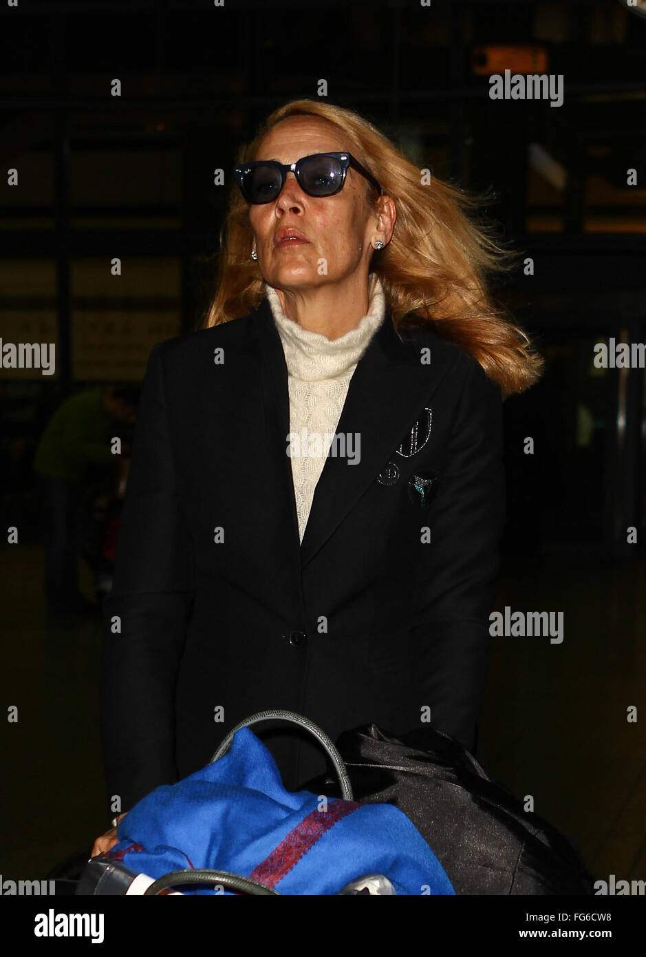 Jerry Hall, recently engaged to Rupert Murdoch, arrives at Heathrow ...