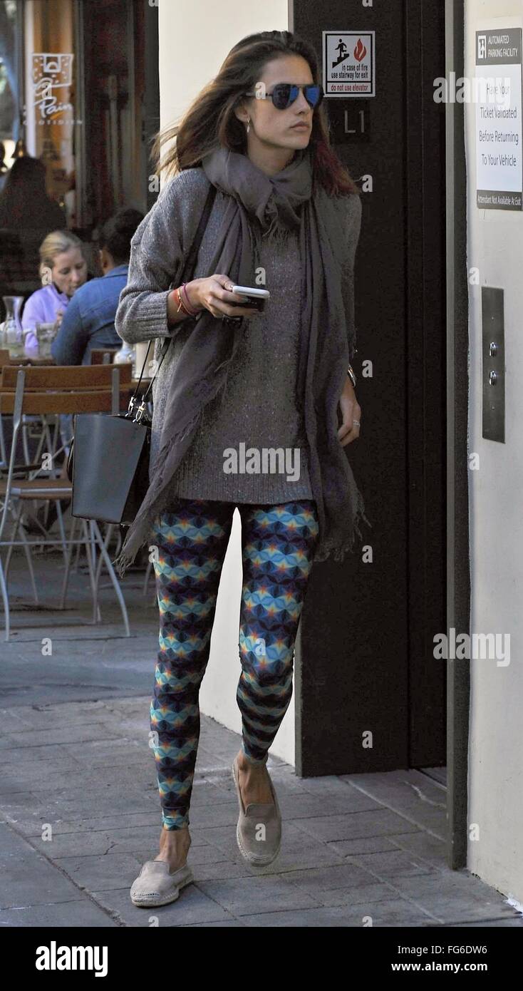 Model Alessandra Ambrosio wearing geometric pattern yoga pants after a ...