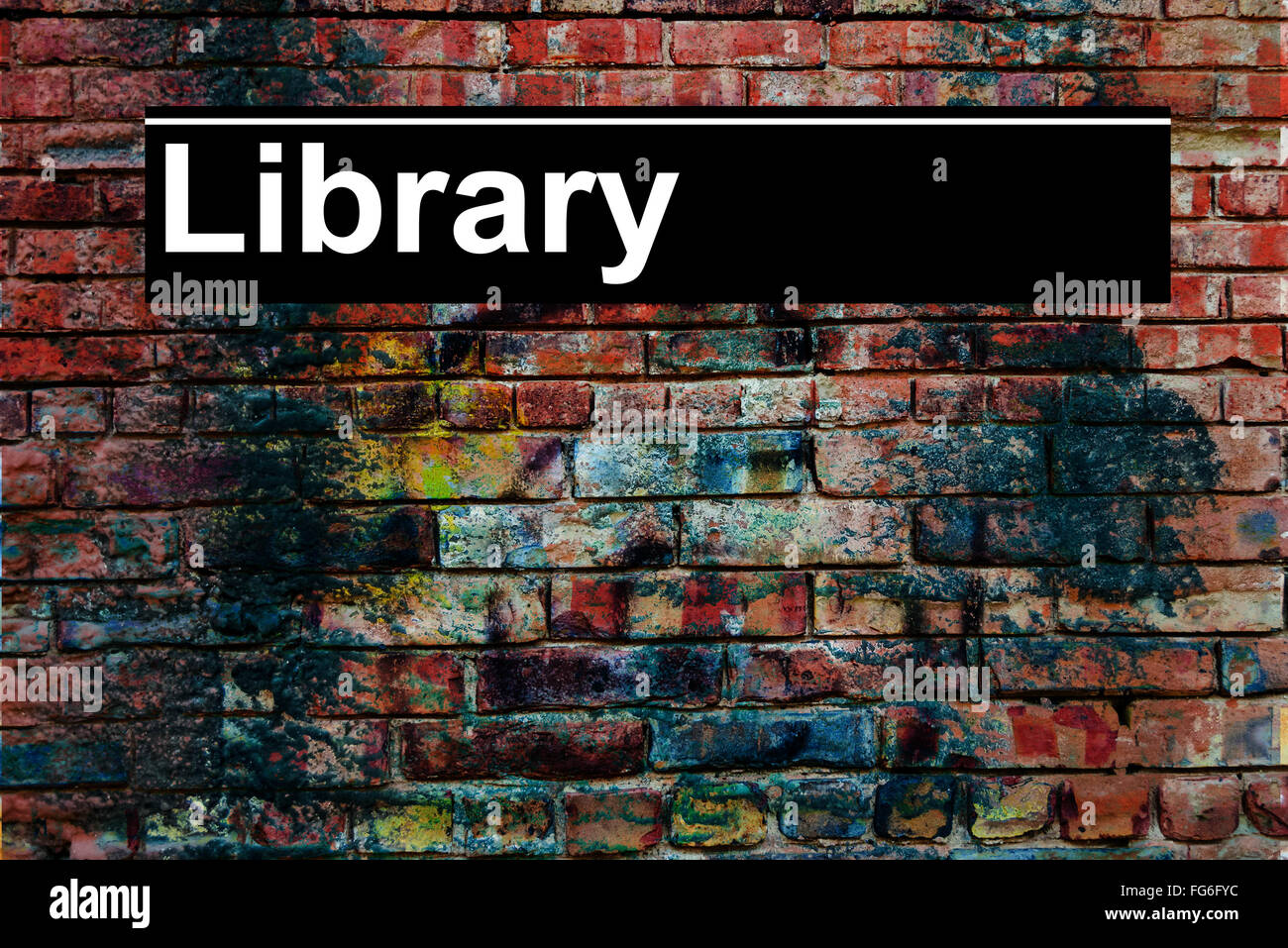 Library Sign on a graffiti brick wall Stock Photo - Alamy