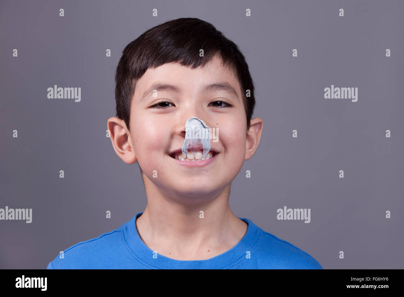 Boy blowing bubble gum hi-res stock photography and images - Alamy