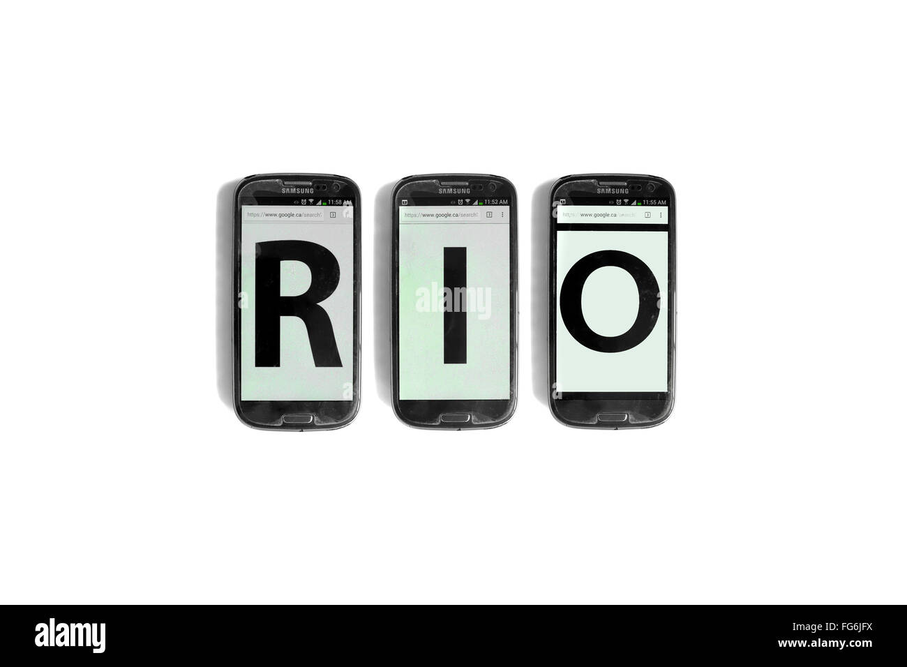 Rio written on smartphone screens photographed against a white ...