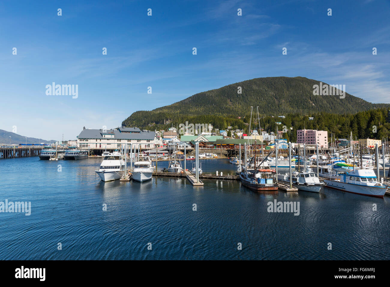 Sailboats and fishing boats docked in Ketchikan's harbor along Creek ...