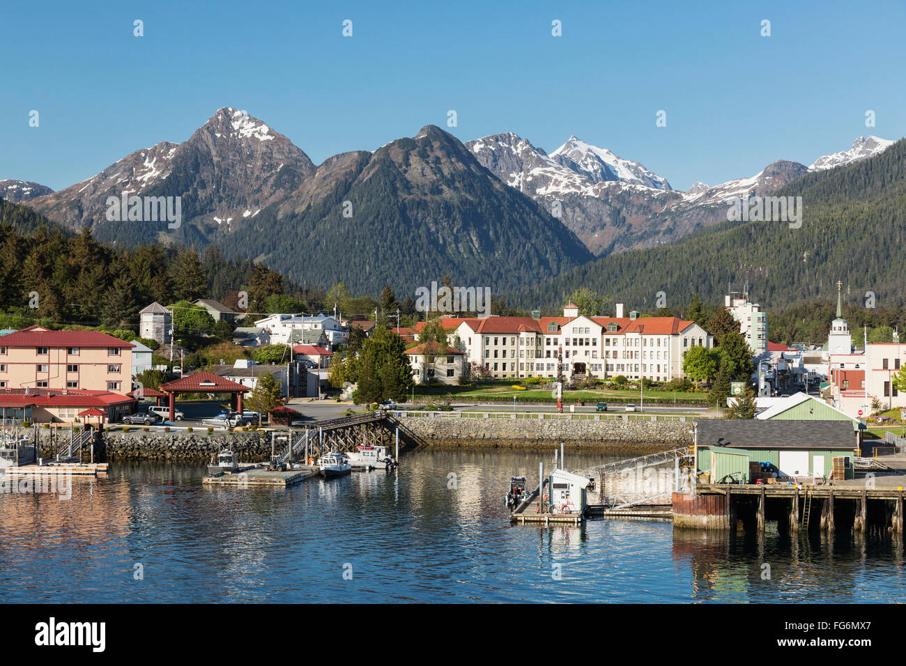 The Pier at the Sitka Harbor with downtown Sitka and the Sisters ...