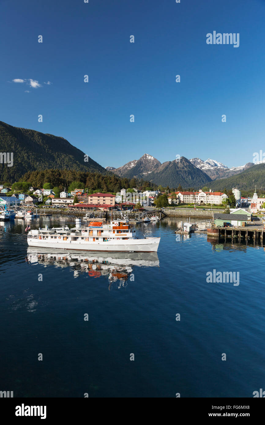 A passenger ship departs from Sitka Harbor with Sitka and the Three ...