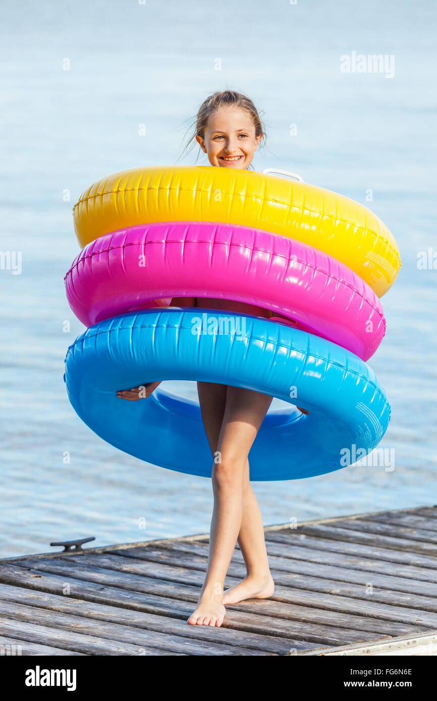 Girl wearing inflatable ring hi-res stock photography and images - Alamy