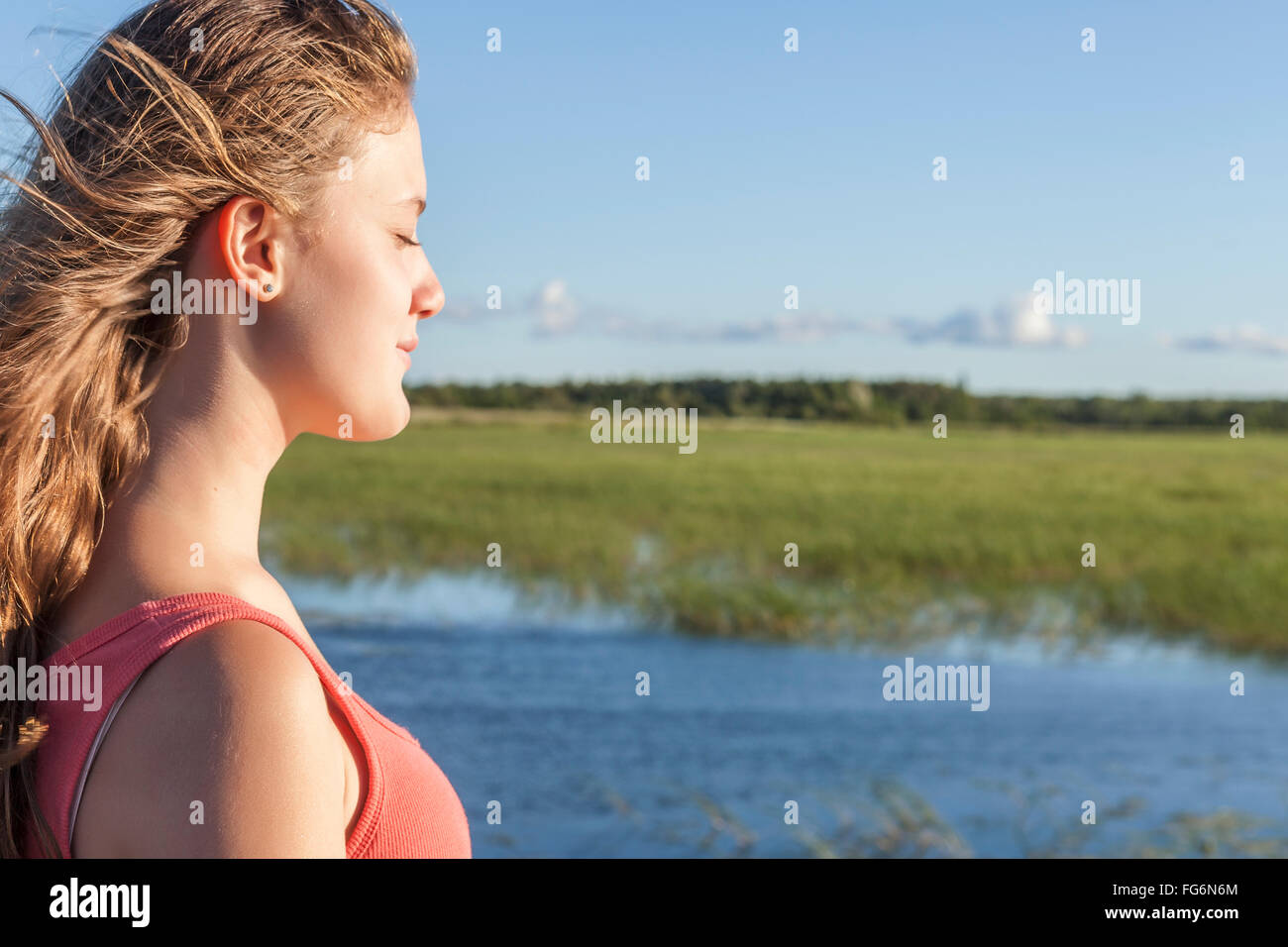 Child facing wind hi-res stock photography and images - Alamy