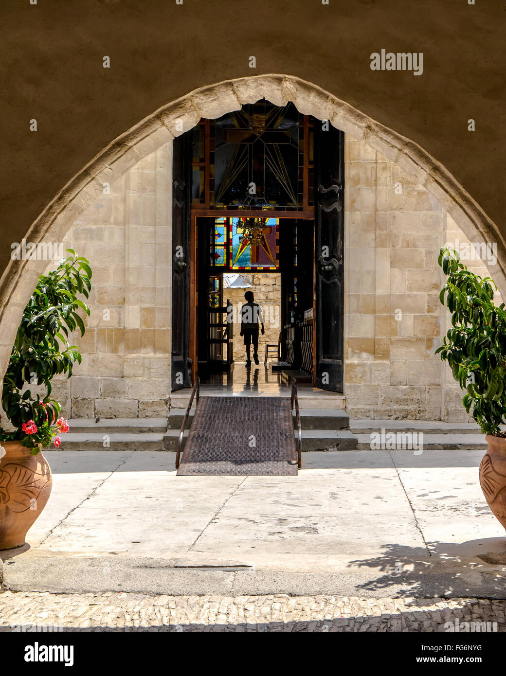 A young boy stands inside Holy Cross (Timios Stavros) Church in the ...