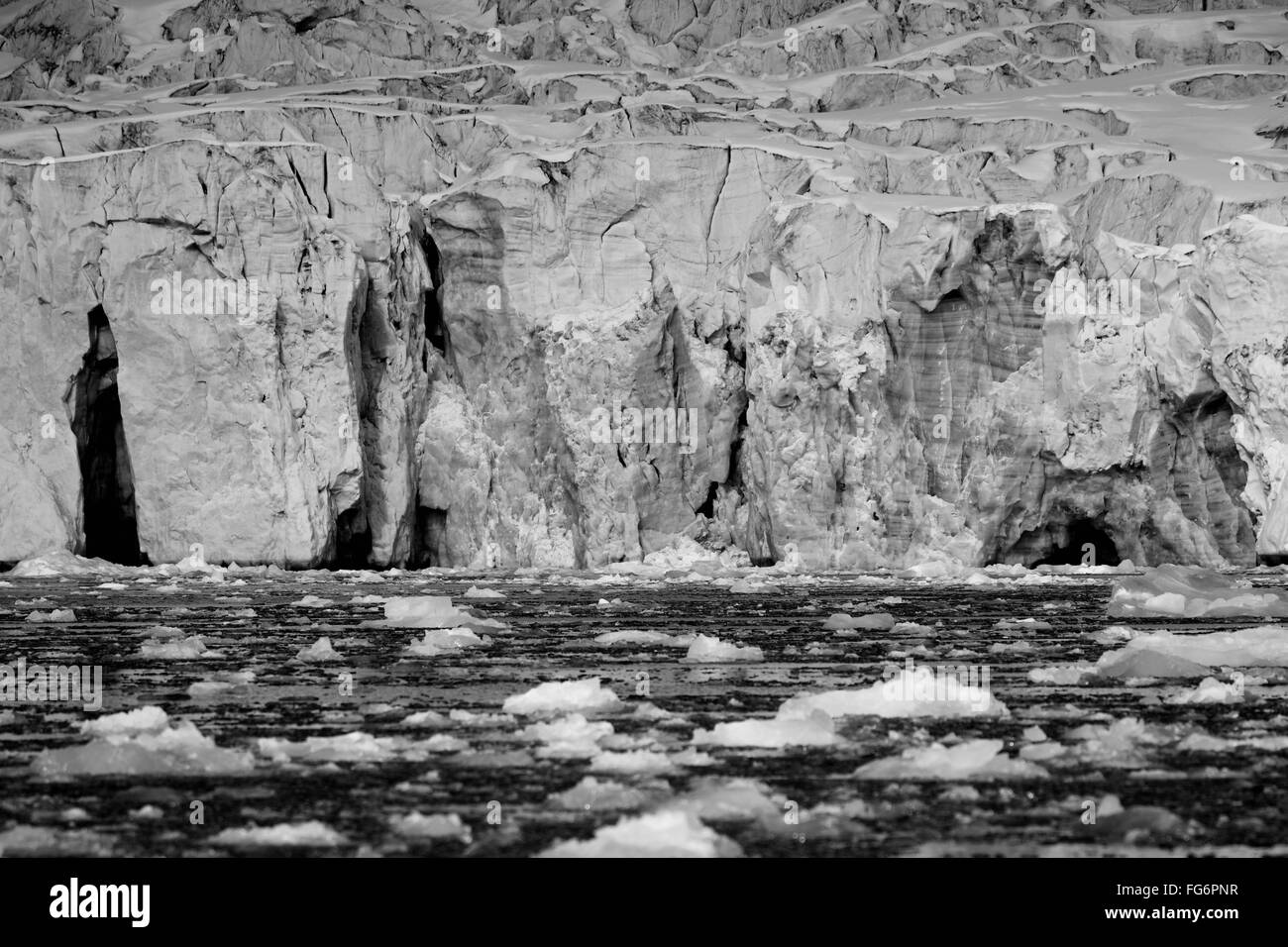 Ice cliff and pieces of ice floating, in the Arctic Ocean; Spitsbergen ...